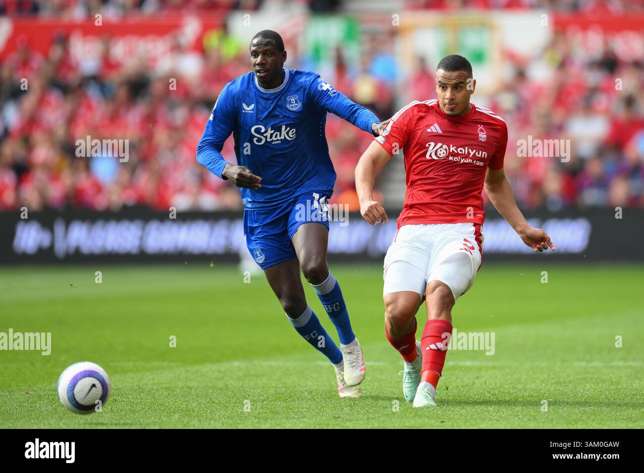 Murillo of Nottingham Forest passes the ball under pressure from ...