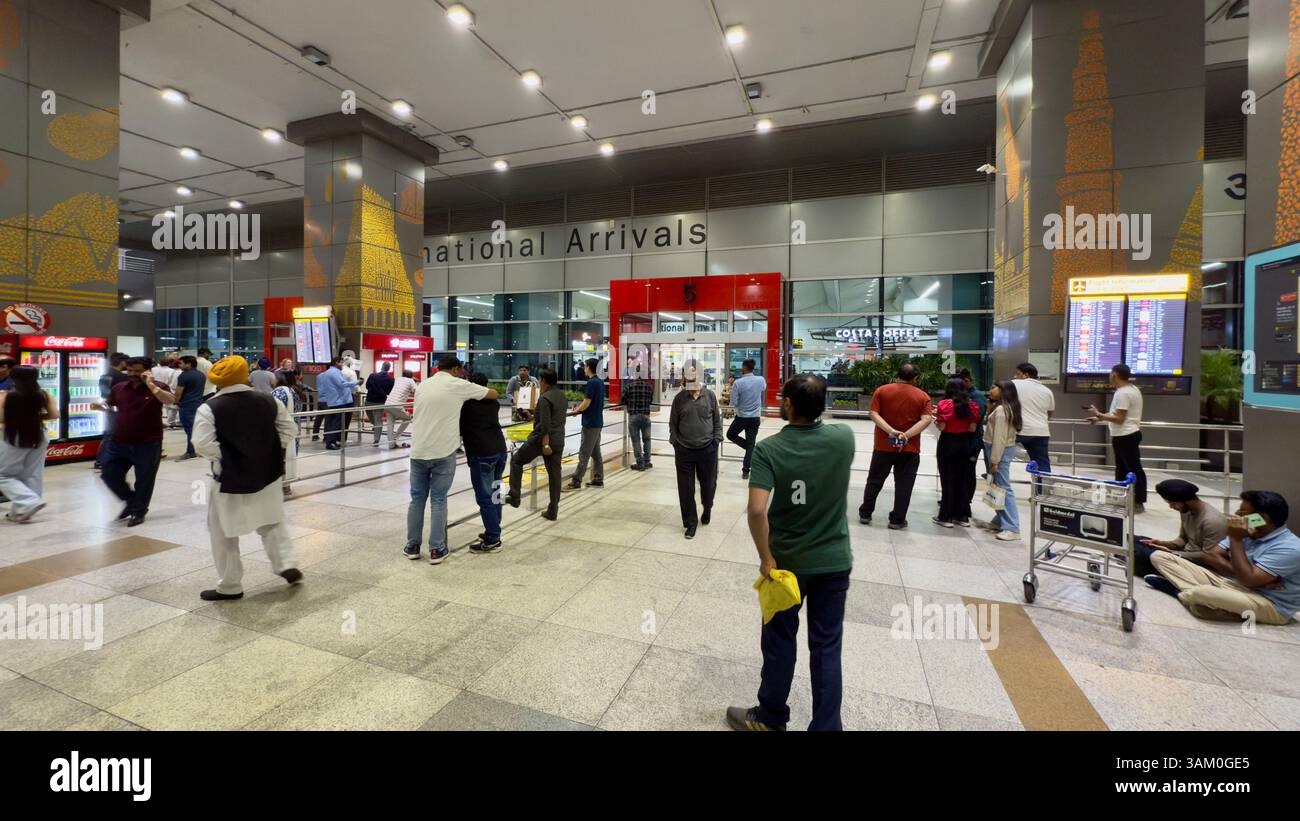 New Delhi, India: April 9, 2025: Crowded airport at the arrival Bernal ...