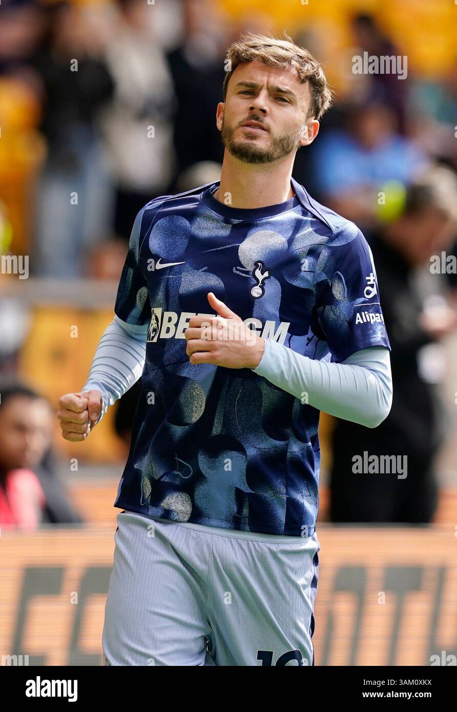 Wolverhampton, UK. 13th Apr, 2025. James Maddison of Tottenham warms up ...