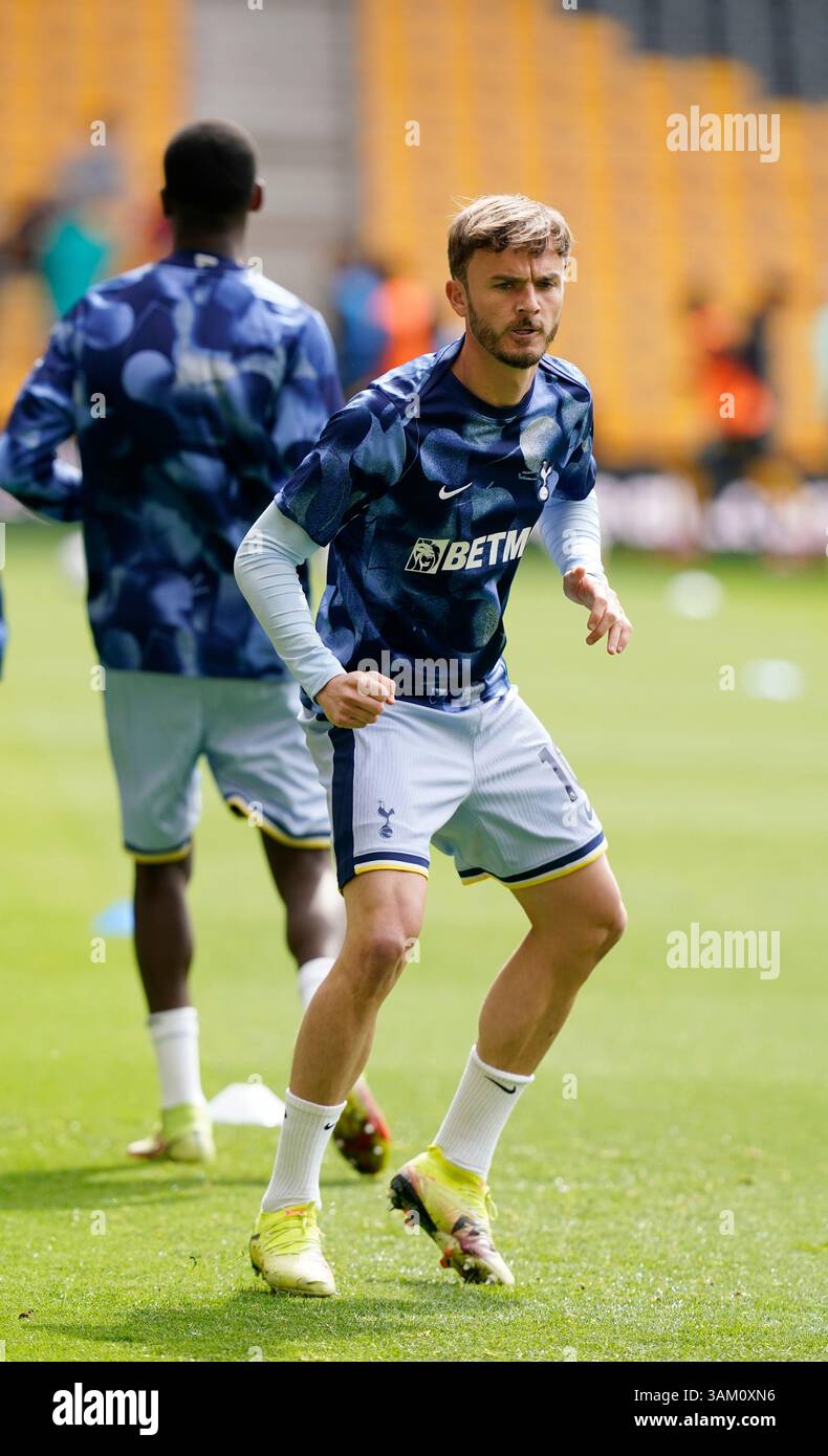Wolverhampton, UK. 13th Apr, 2025. James Maddison of Tottenham warms up ...