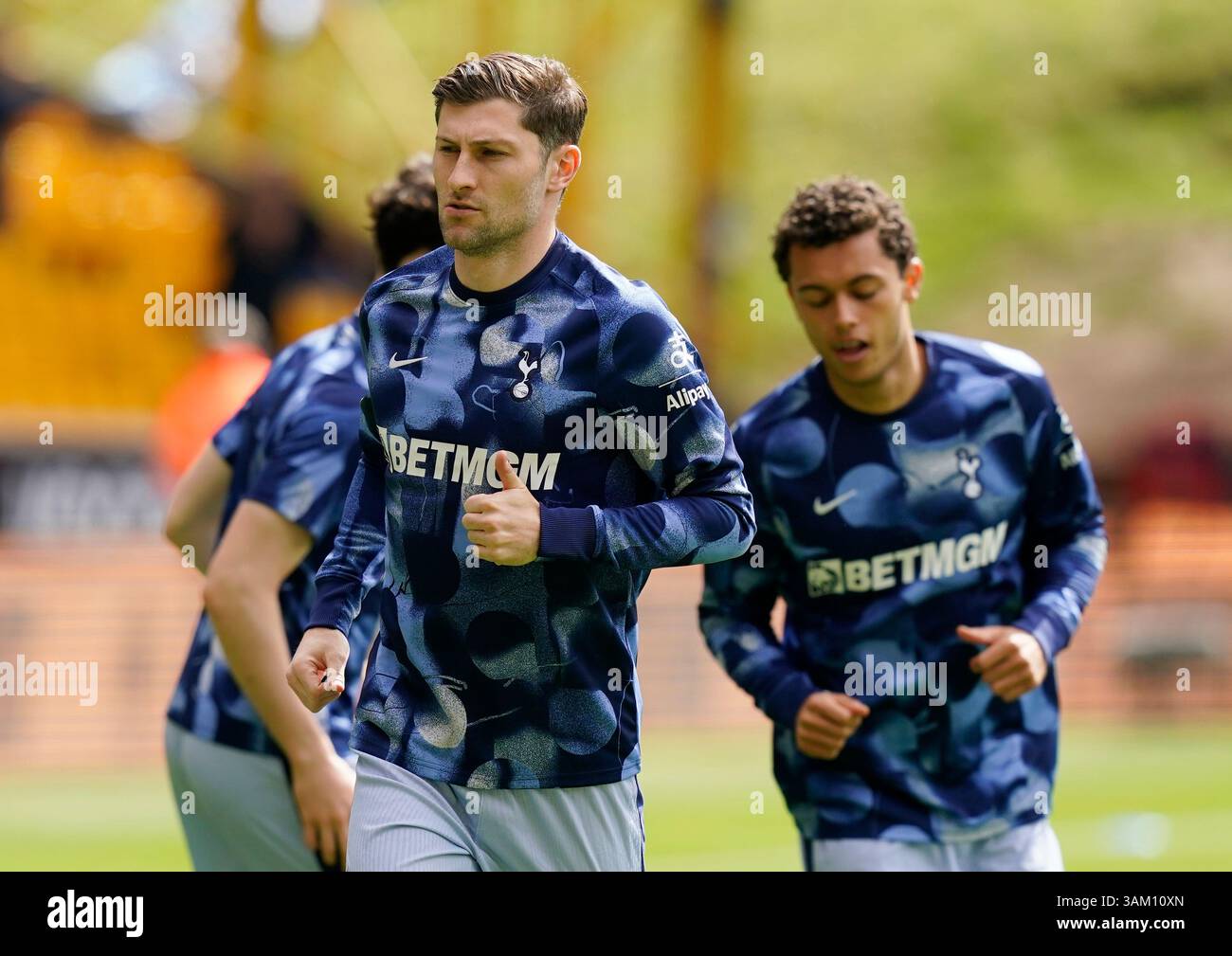 Wolverhampton, England, 13th April 2025. Ben Davies of Tottenham warms ...