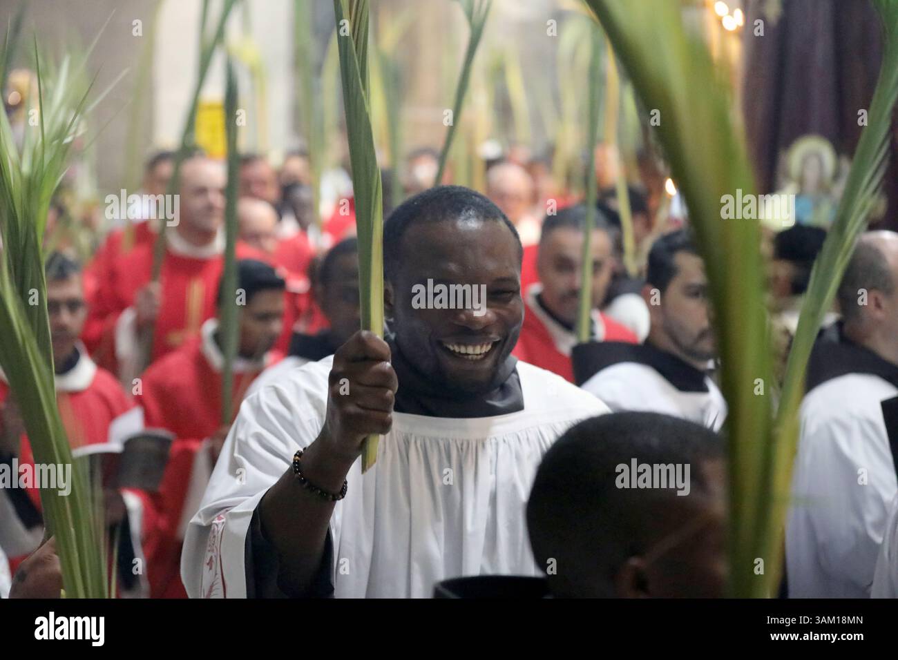 Jerusalem, Israel. 13th Apr, 2025. Monks marching with date palm ...