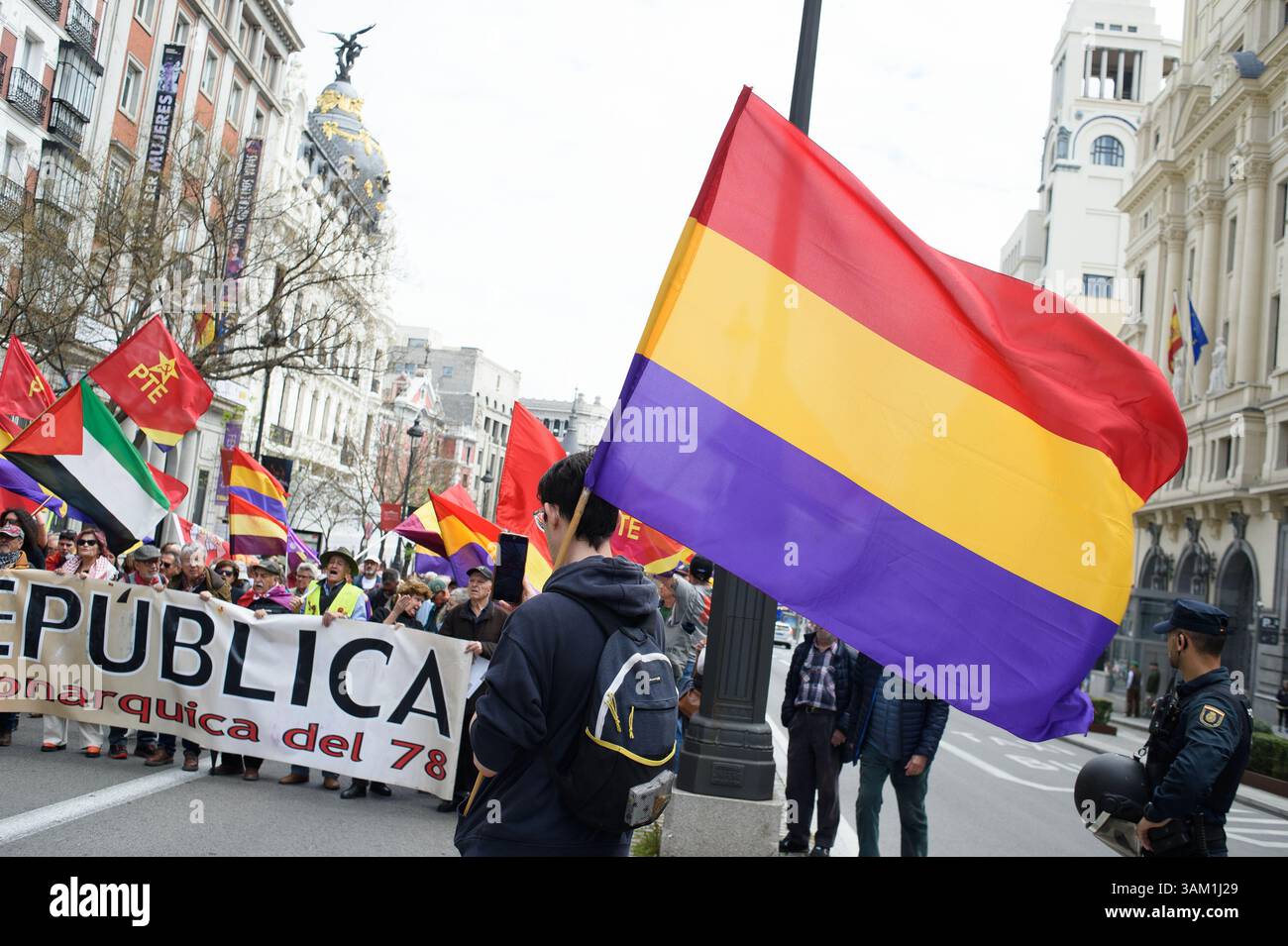 People protest during a march against the monarchy, the end of King ...
