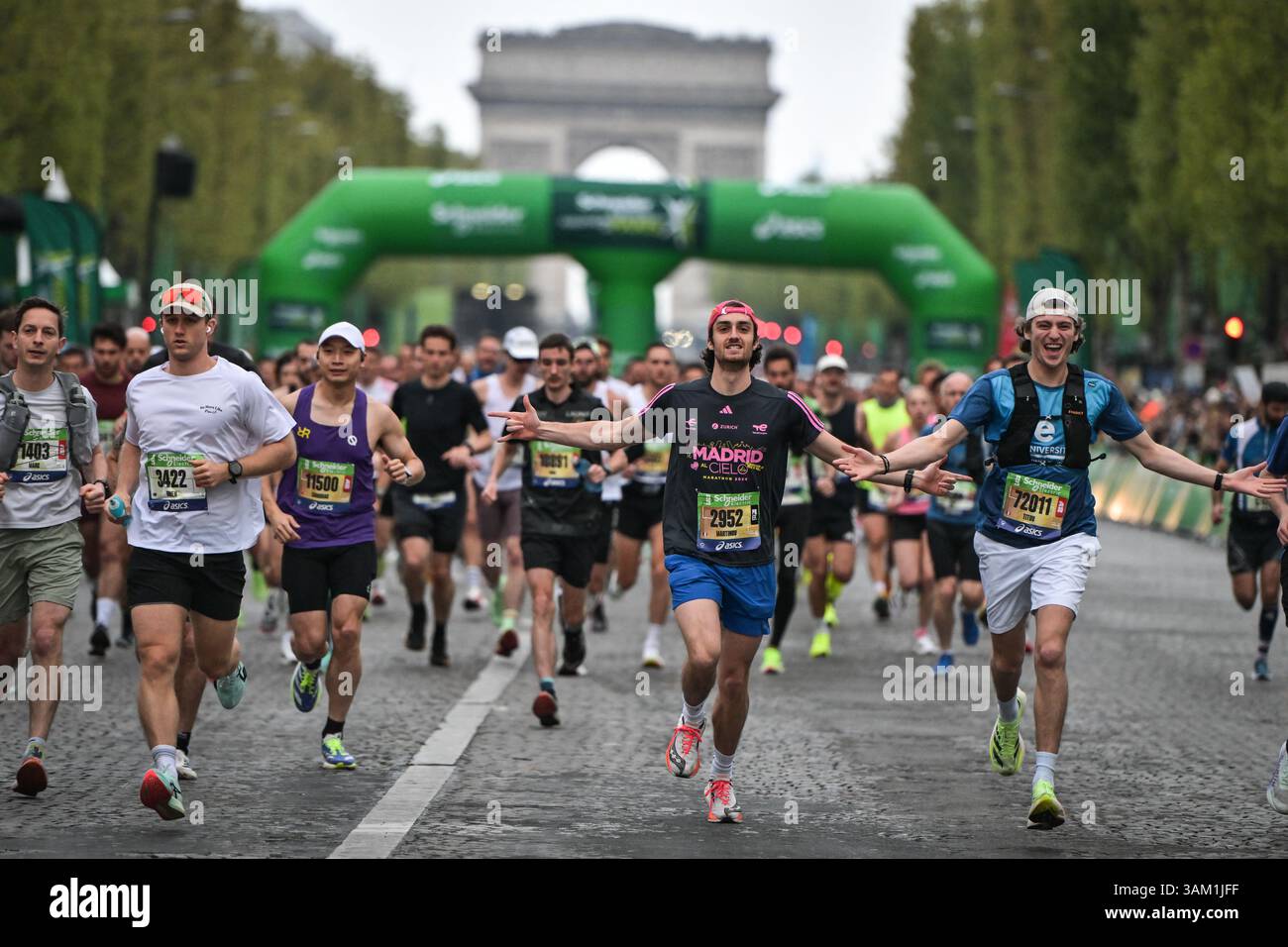 Paris, France. 13th Apr, 2025. Runners participate in the Paris ...
