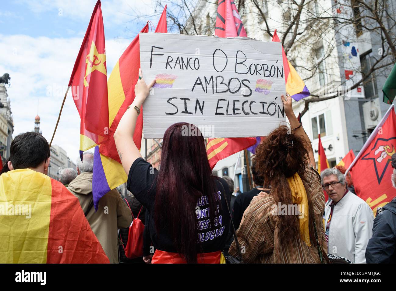 People protest during a march against the monarchy, the end of King ...