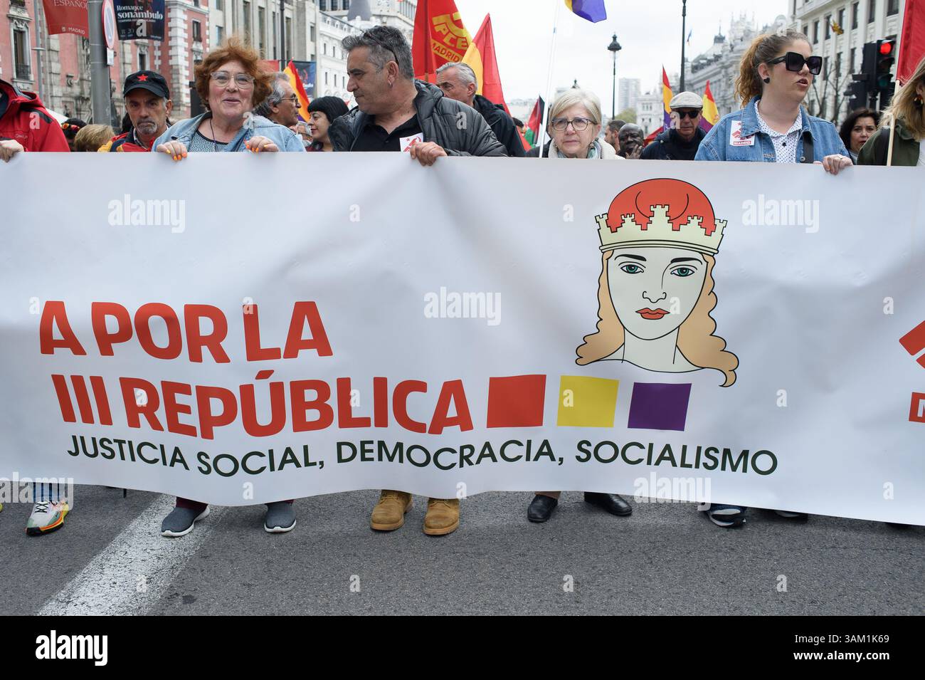 People protest during a march against the monarchy, the end of King ...