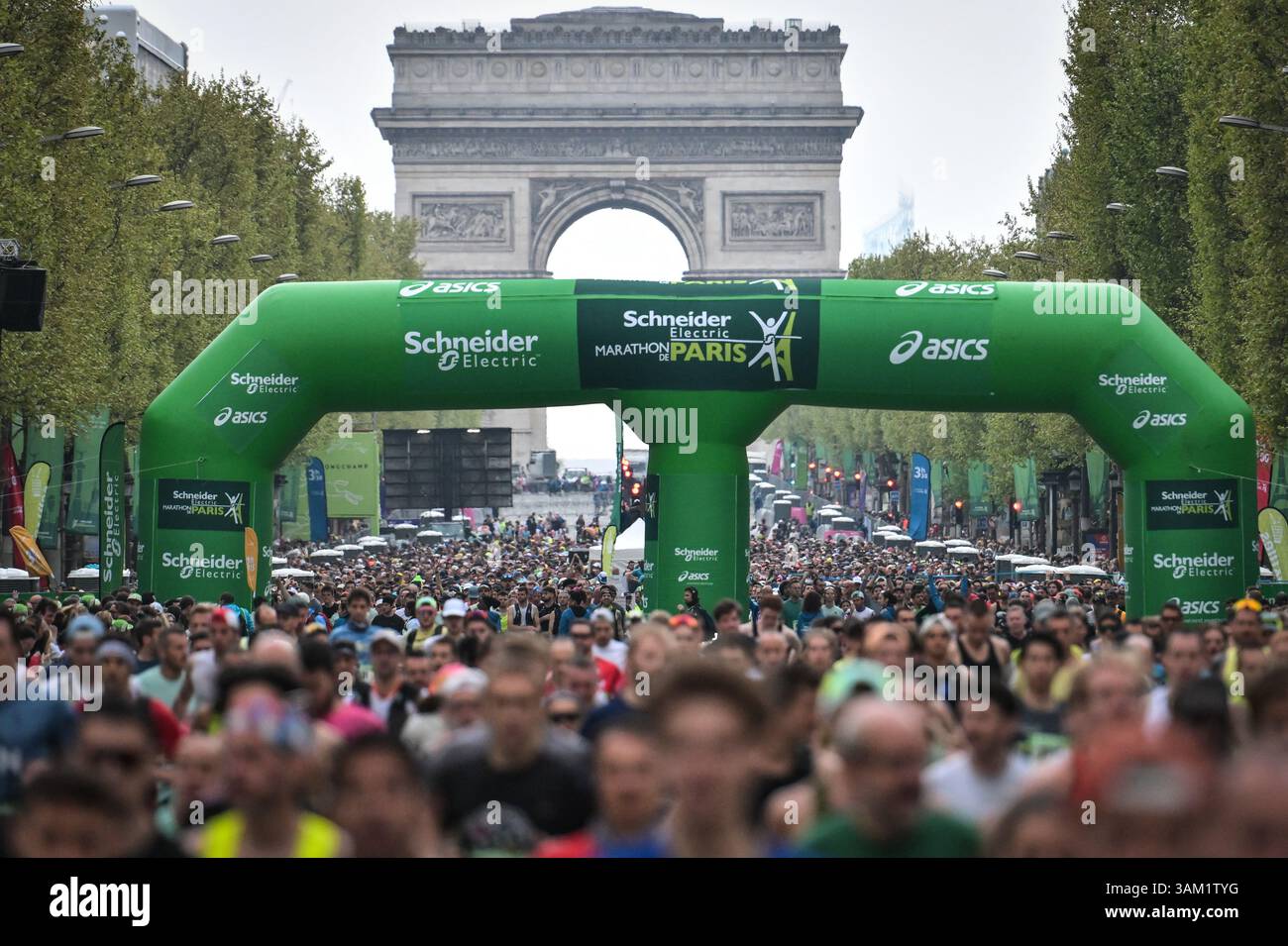Paris, France. 13th Apr, 2025. Runners participate in the Paris ...