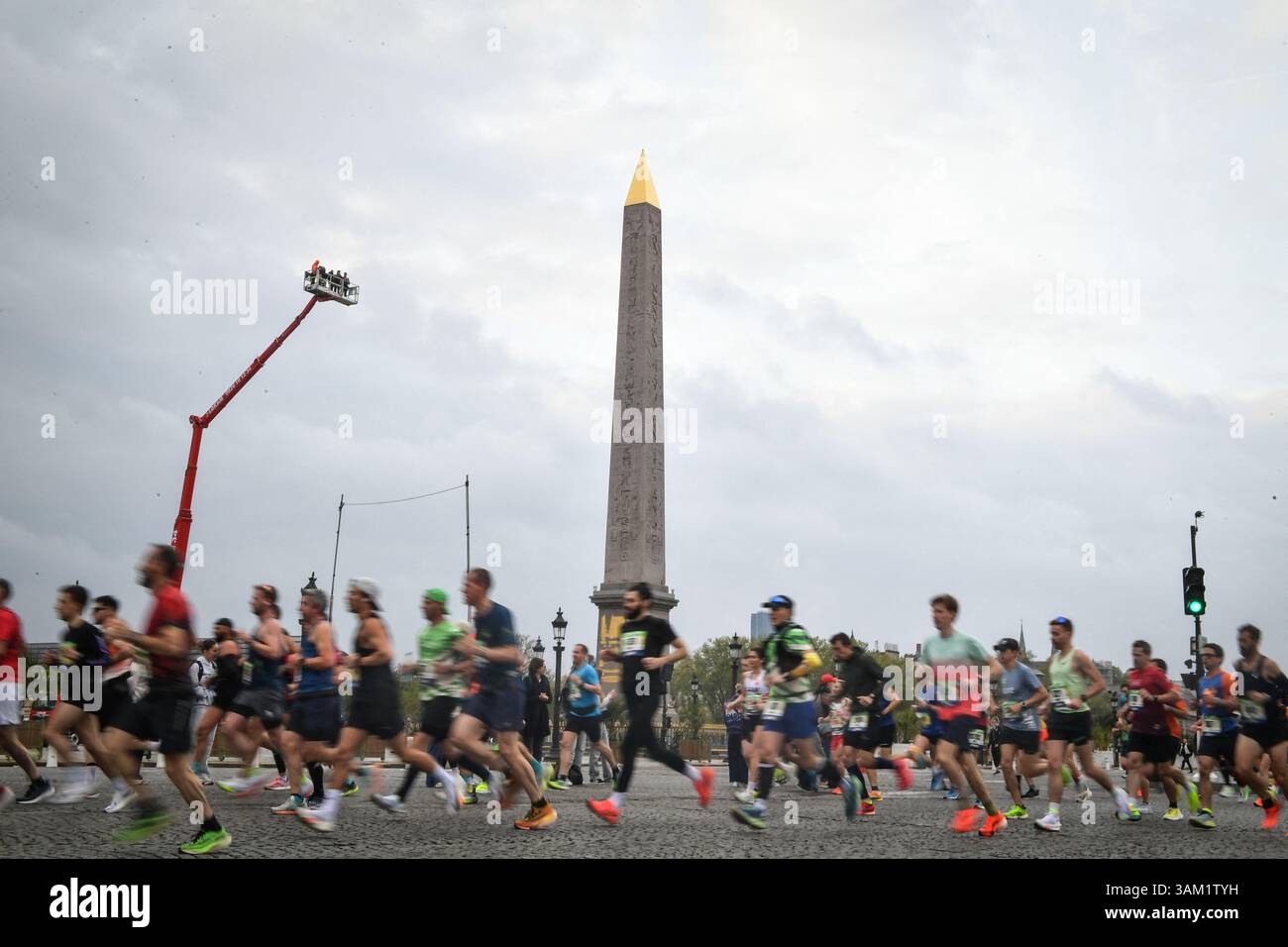 Paris, France. 13th Apr, 2025. Runners participate in the Paris ...