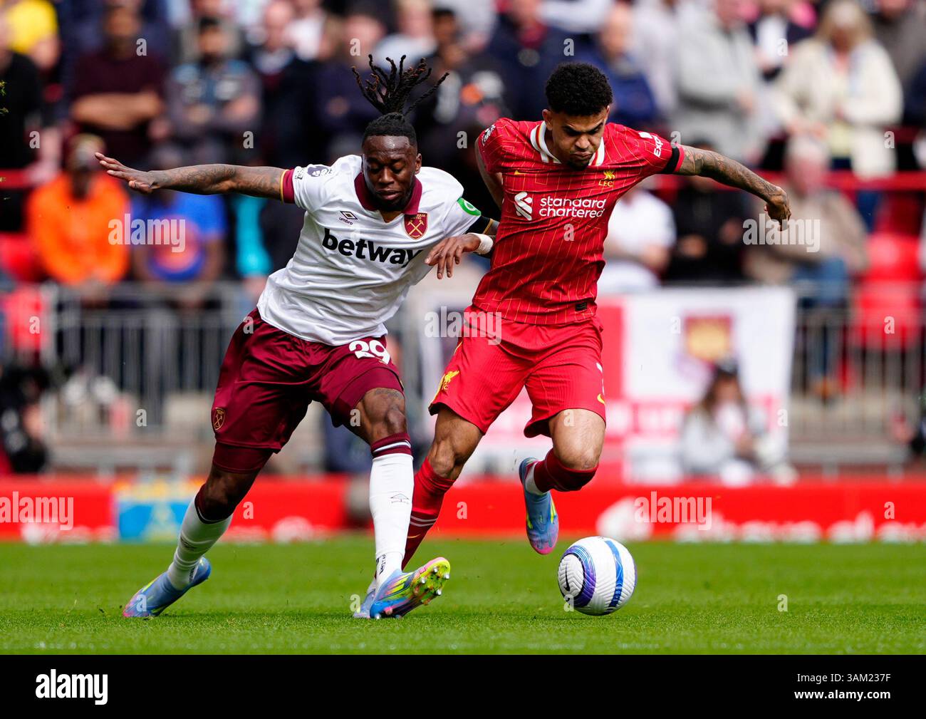 West Ham United's Aaron Wan-Bissaka (left) and Liverpool's Luis Diaz ...
