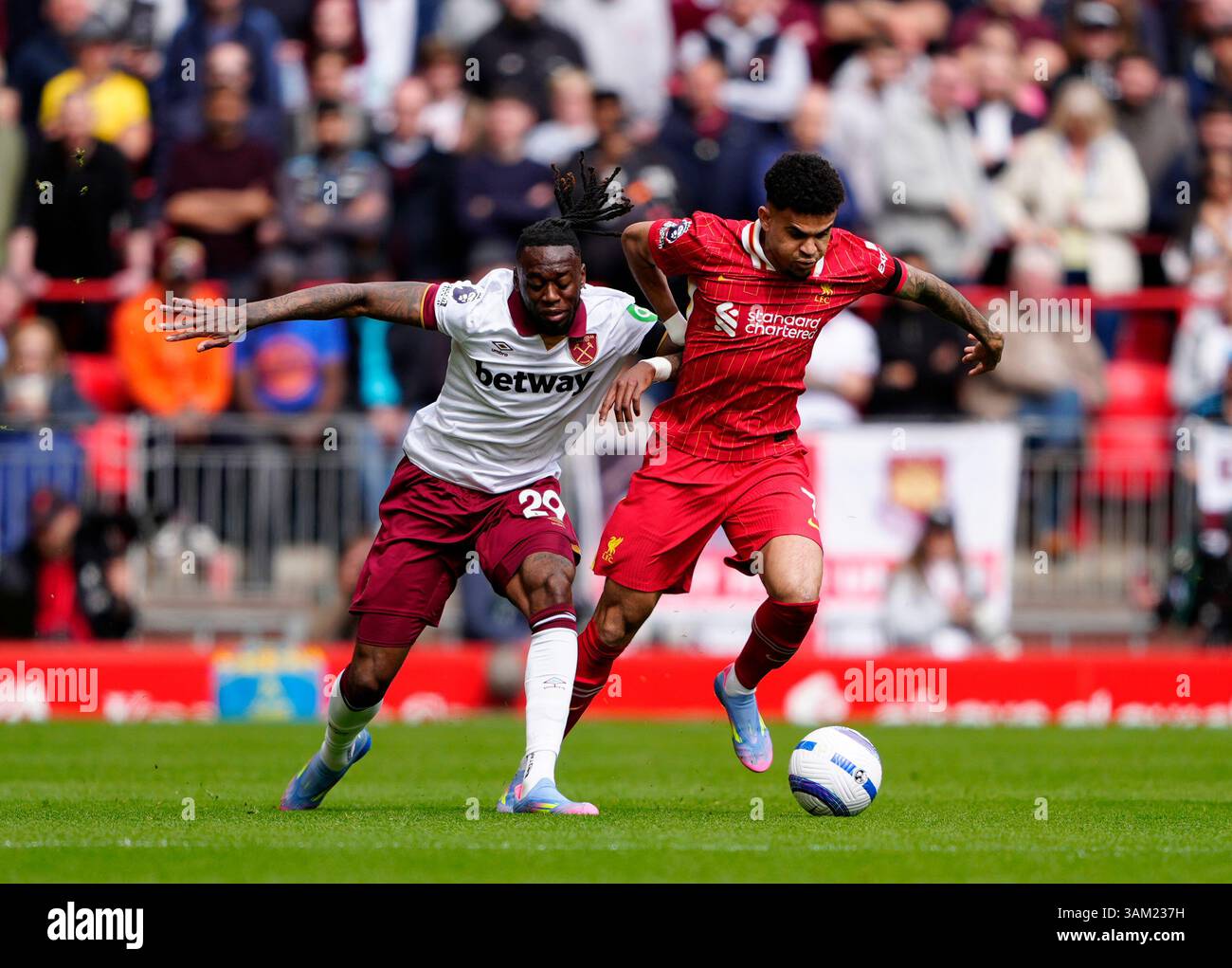 West Ham United's Aaron Wan-Bissaka (left) and Liverpool's Luis Diaz ...