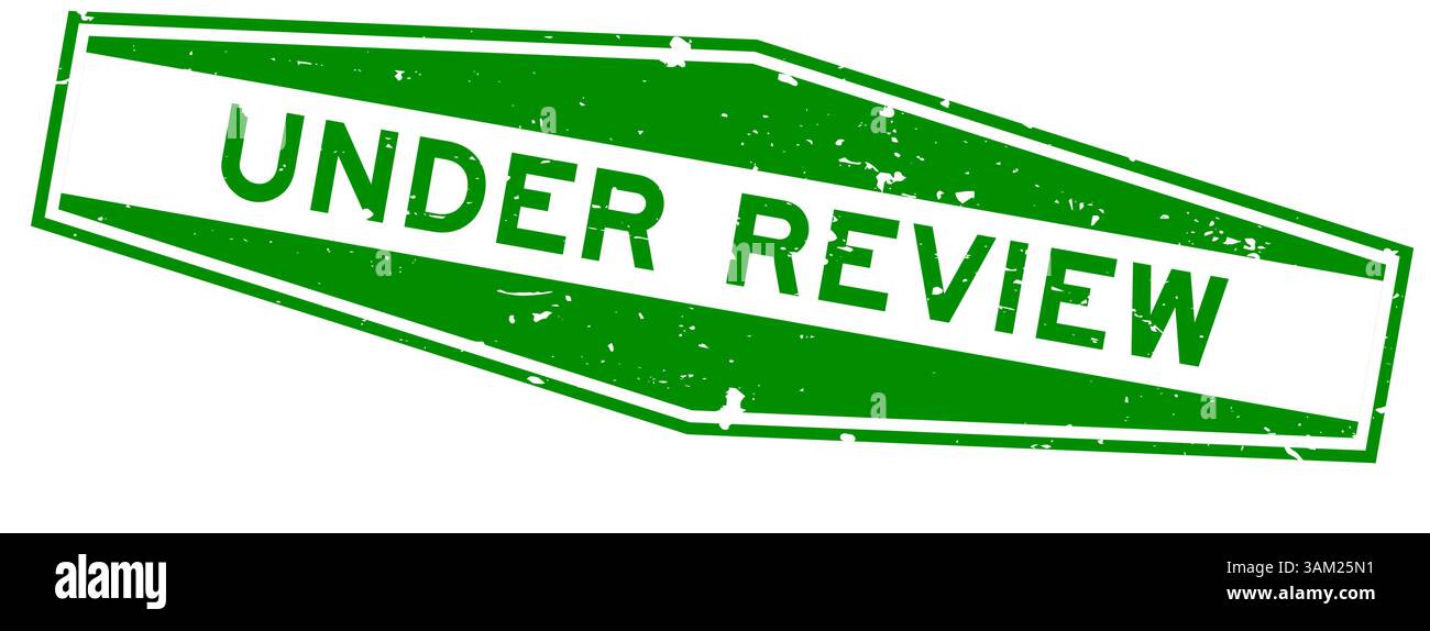 Grunge green under review word hexagon rubber seal stamp on white ...