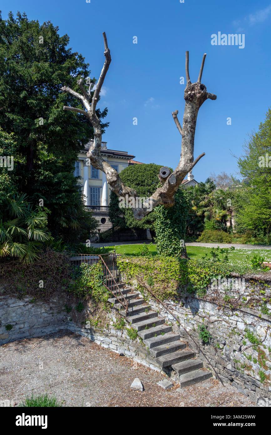 Como, Italy - April 4, 2025: The picturesque villa along the shore of ...