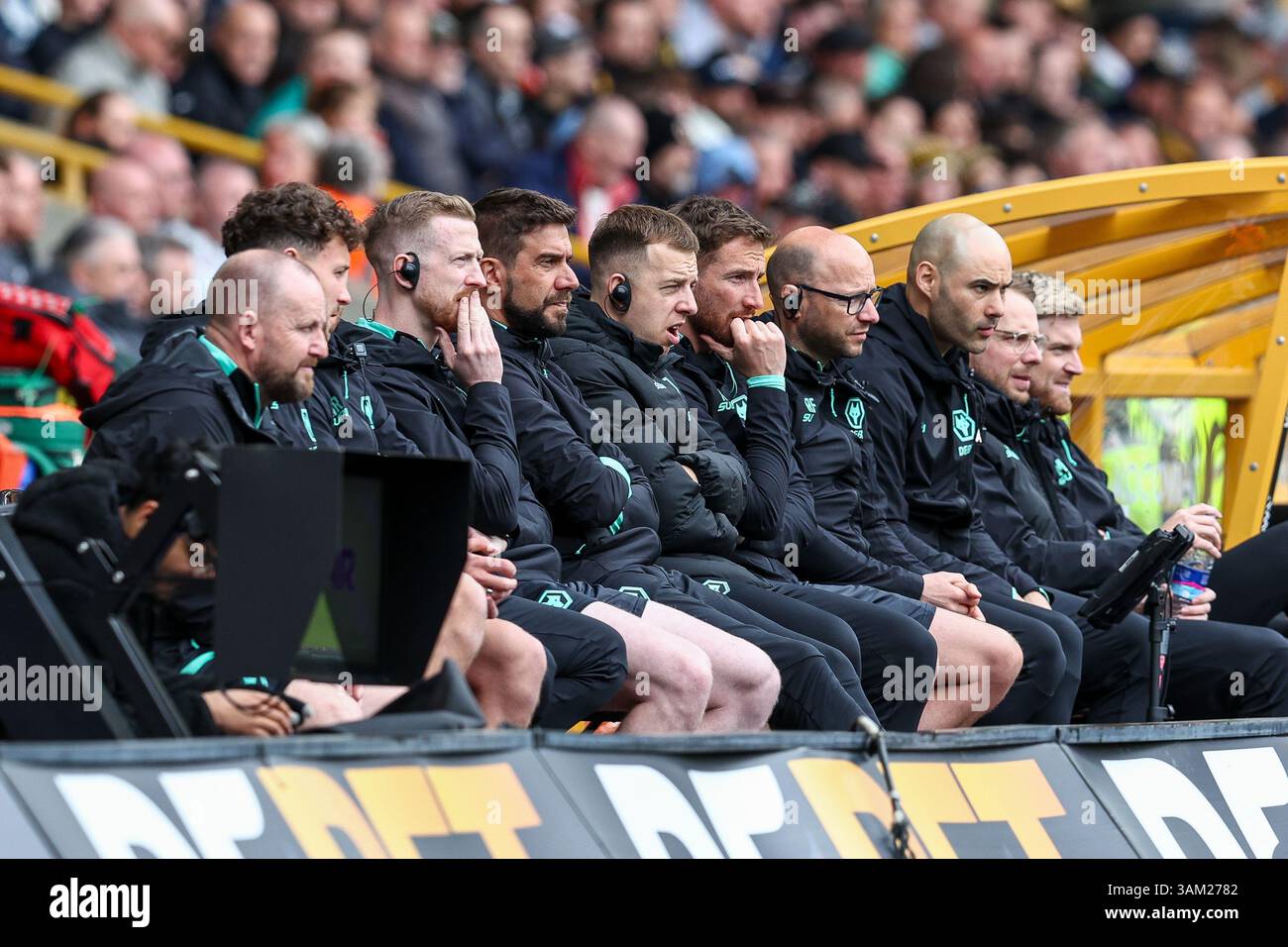 Wolverhampton Wanderers staff watch the action during the Premier ...