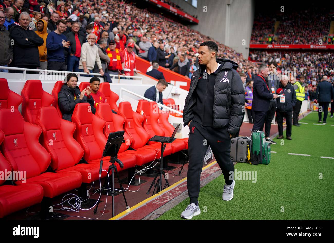 Liverpool's Trent Alexander-Arnold walks to the bench before the ...