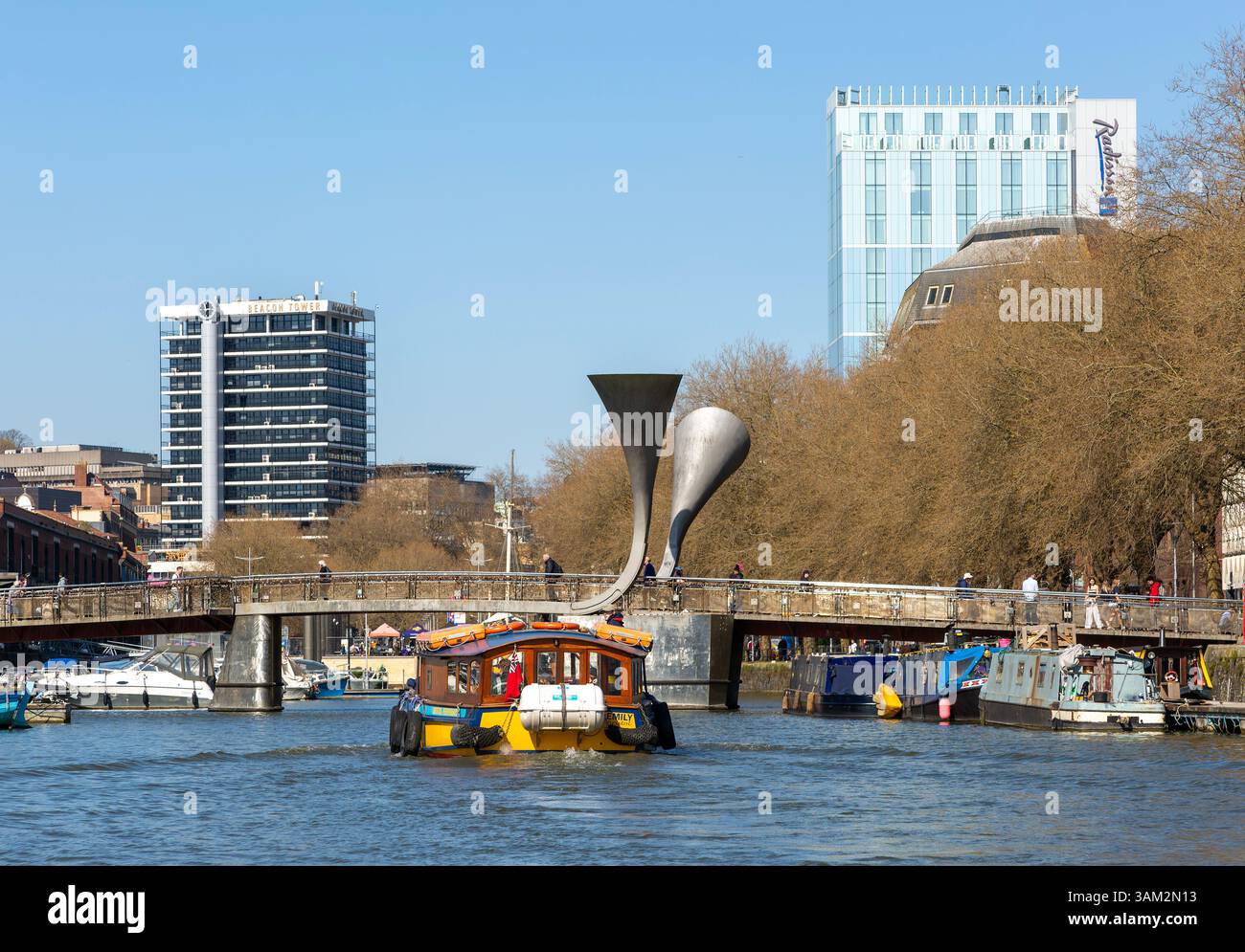 Waterbus ferry boat approaching city centre, Pero's Bridge footbridge ...