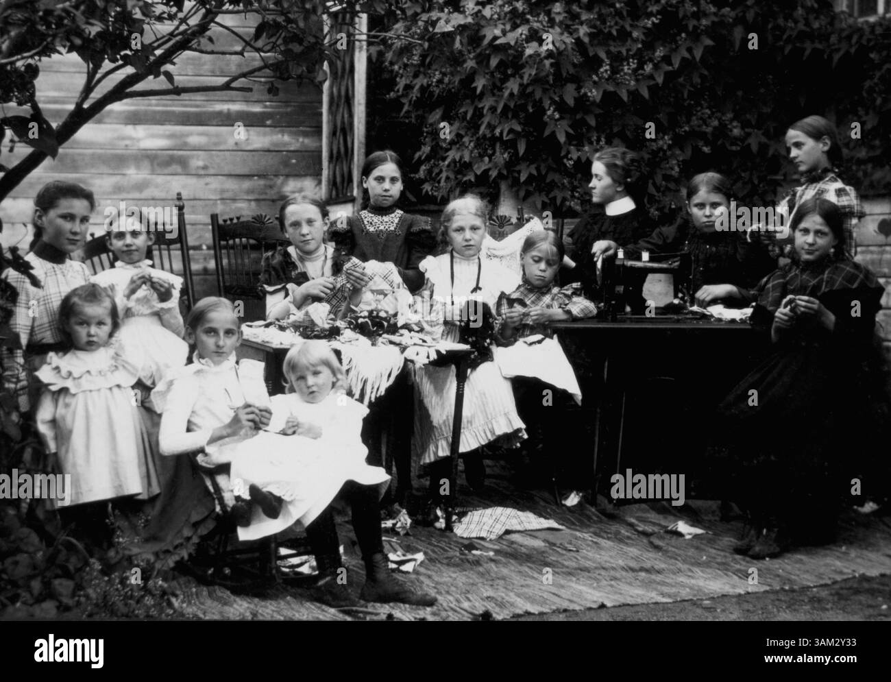 June 1, 1900 - Group of Women and Children With Sewing Machine ...