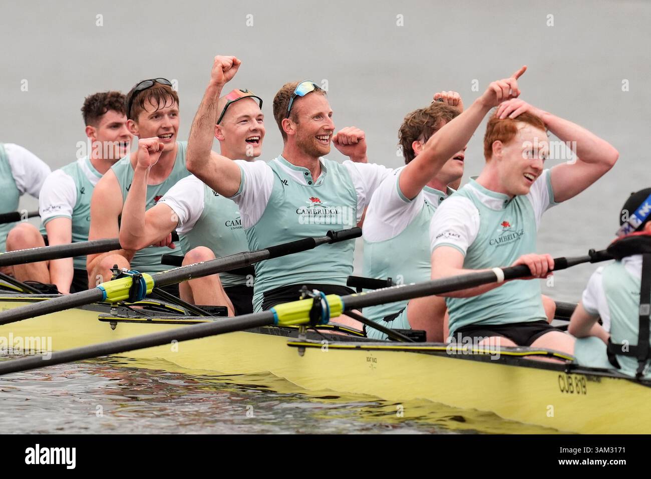 Cambridge men's James Robson (centre) and team celebrate victory over ...