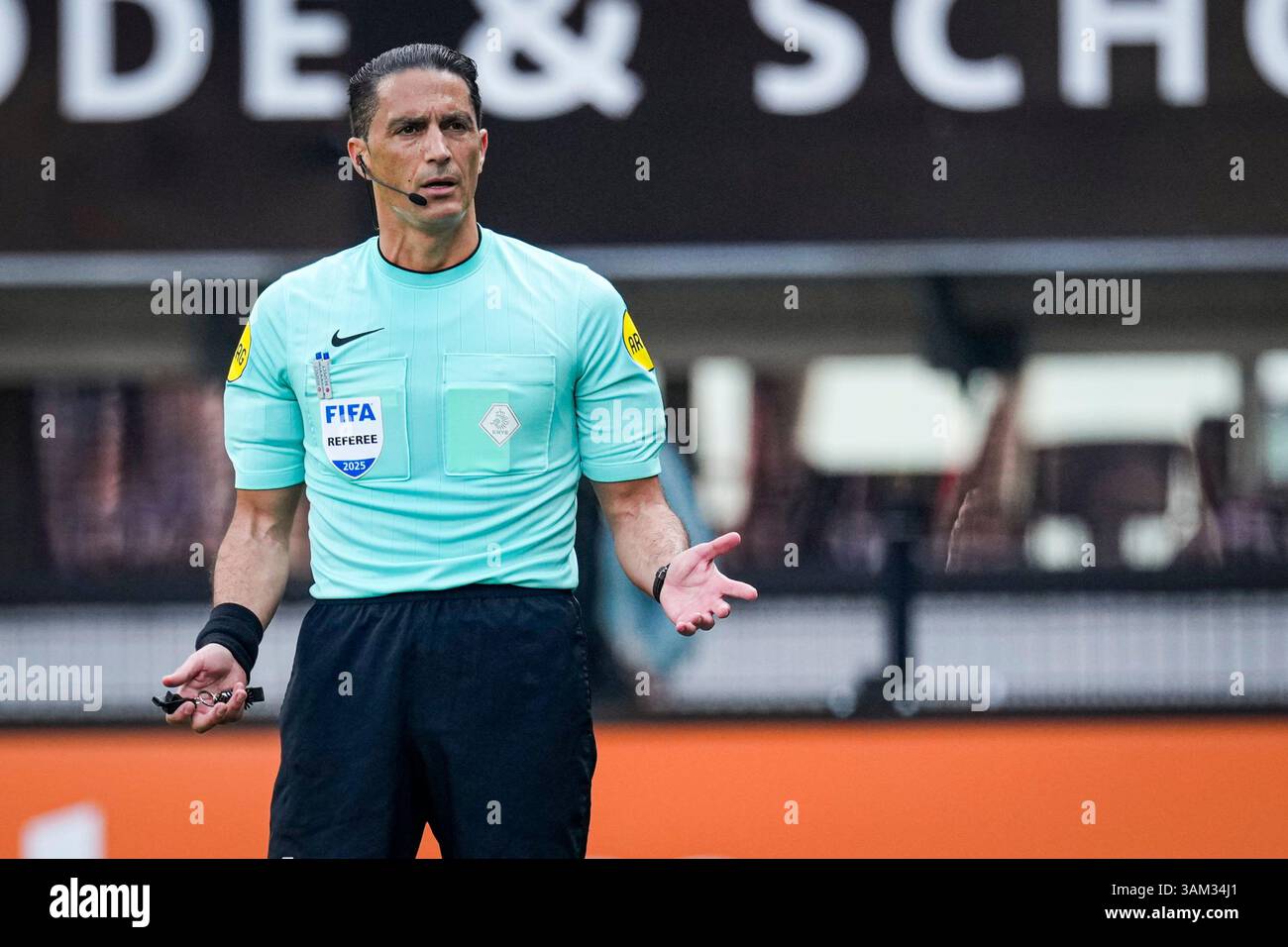 ALMELO, NETHERLANDS - APRIL 13: Referee Serdar Gozubuyuk gestures ...