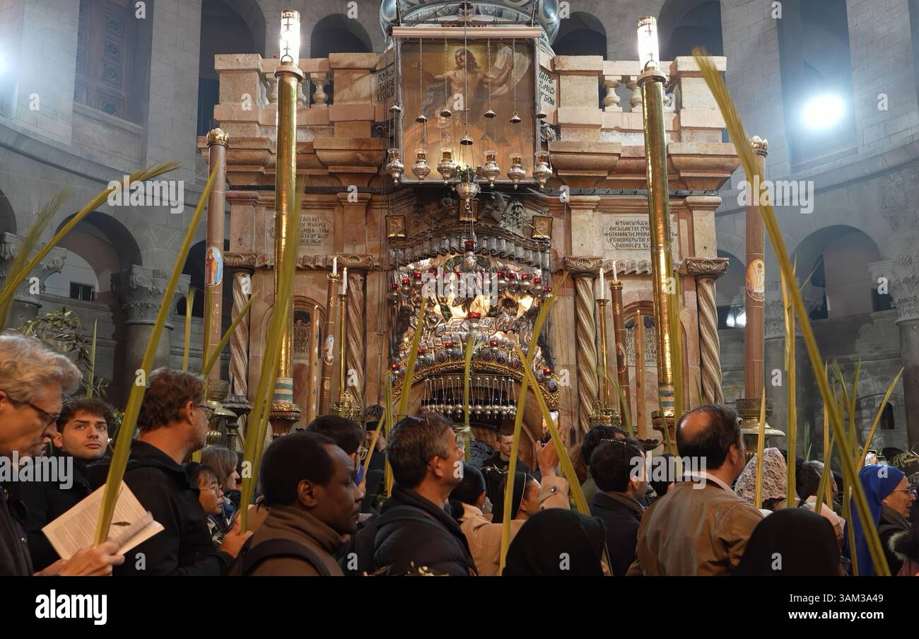 JERUSALEM, APRIL 13: Christian devotees wave palm fronds as they circle ...