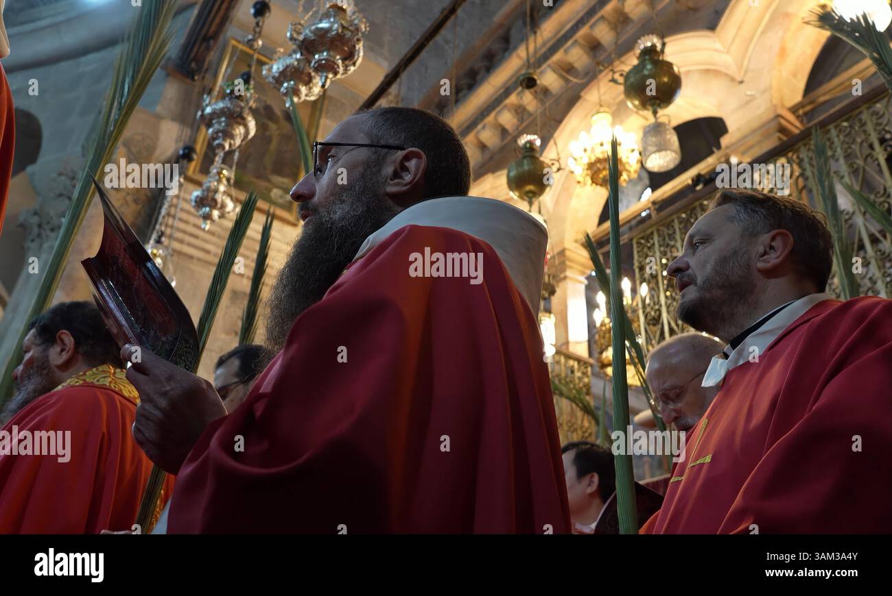 JERUSALEM - APRIL 13: Roman Catholic priests sing while holding palm ...