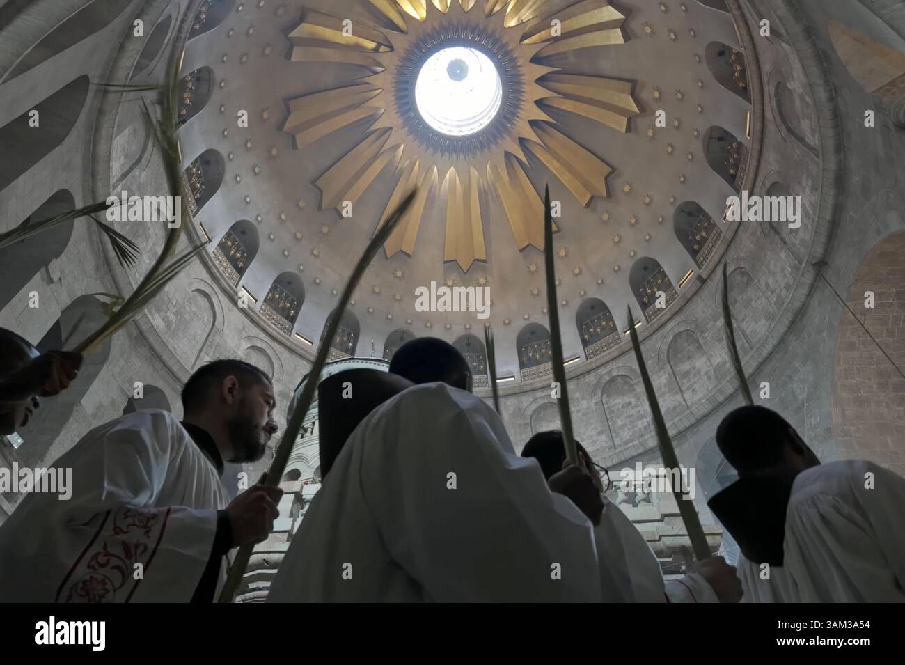 JERUSALEM - APRIL 13: Roman Catholic priests wave palm fronds as they ...