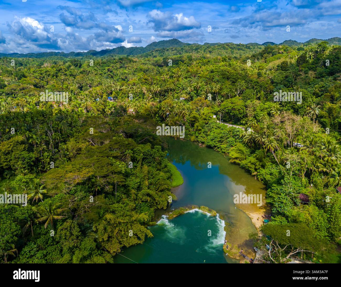 Loboc River with small waterfall and river threshold in Bohol island ...