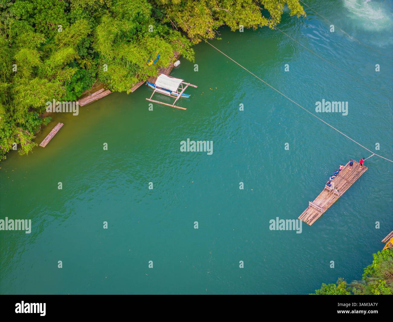 Loboc River with palm trees in Bohol island, Philippines. Aerial drone ...