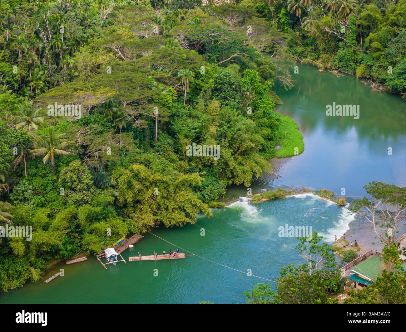 Loboc River with small waterfall and river threshold in Bohol island ...