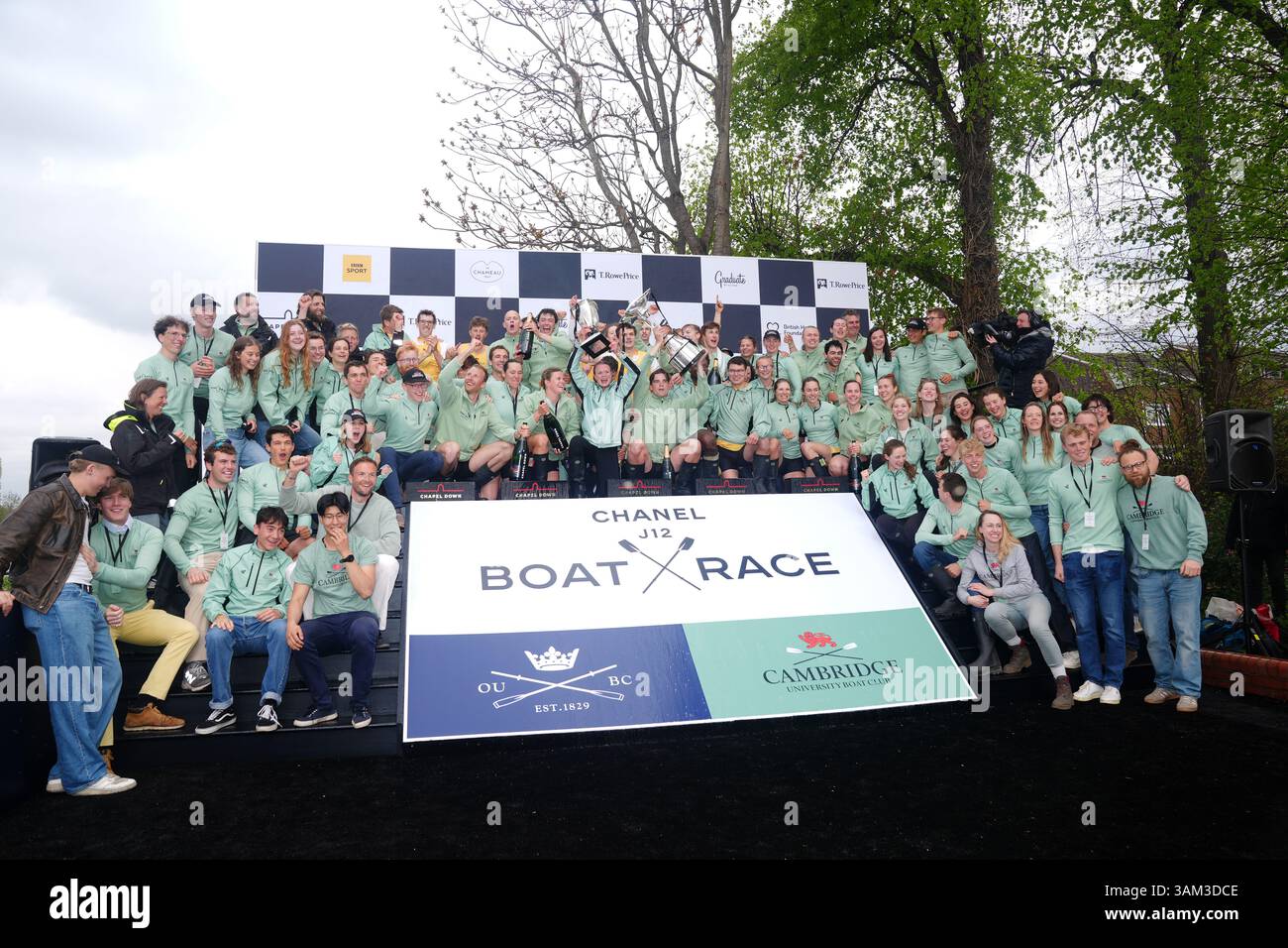 The Cambridge Men's and Women's teams celebrate with their trophies ...