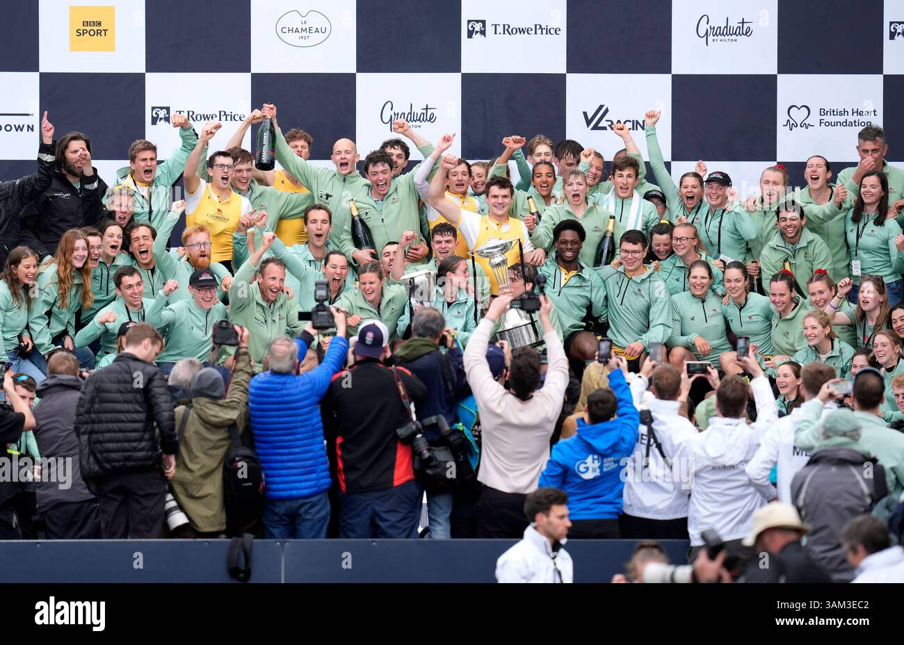 Cambridge women's team and Cambridge men's team rowers celebrate with ...