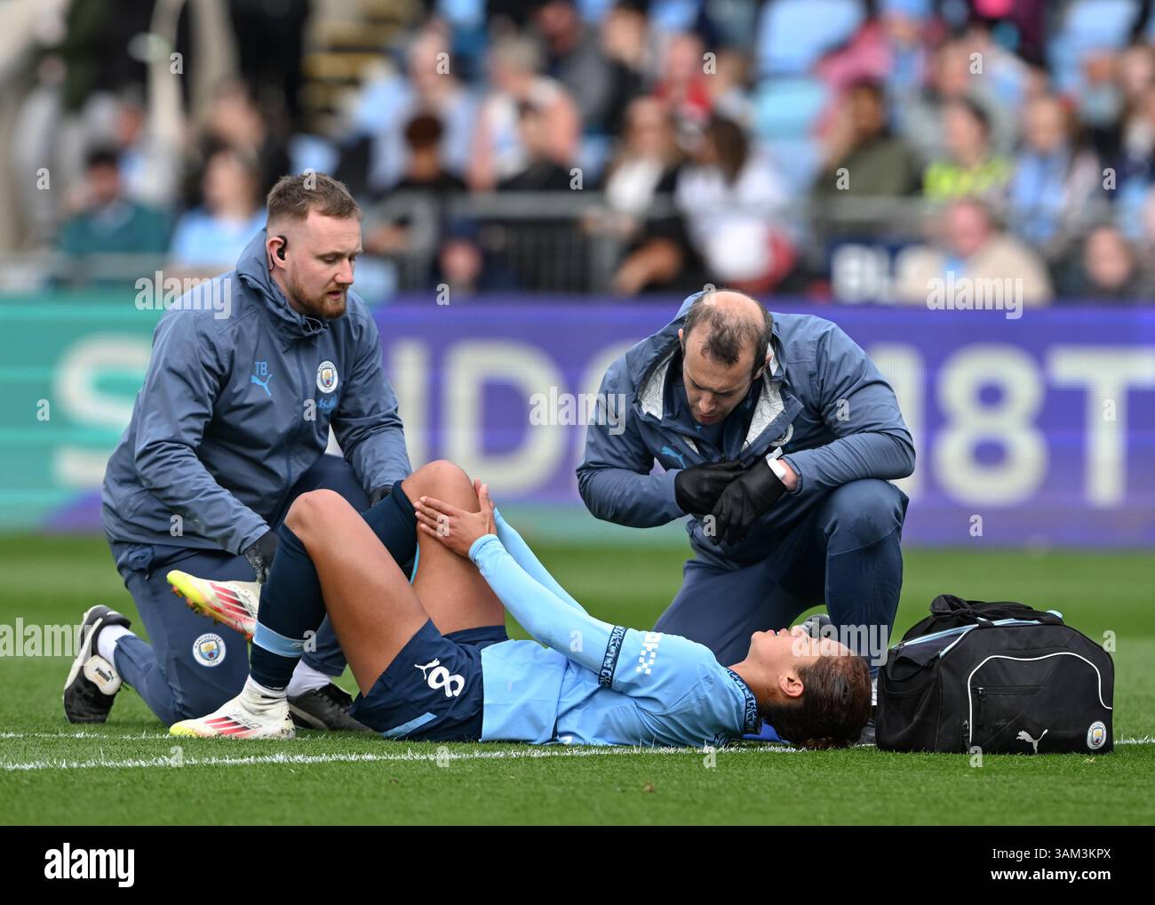 Manchester, UK. 13th Apr, 2025. Mary Fowler of Manchester City Women goes down with an injury ...