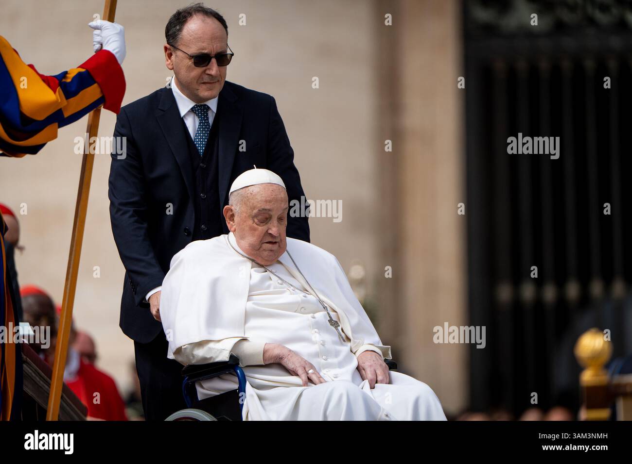 Pope Francis leaves St. Peter's Square in a wheelchair at the end of ...