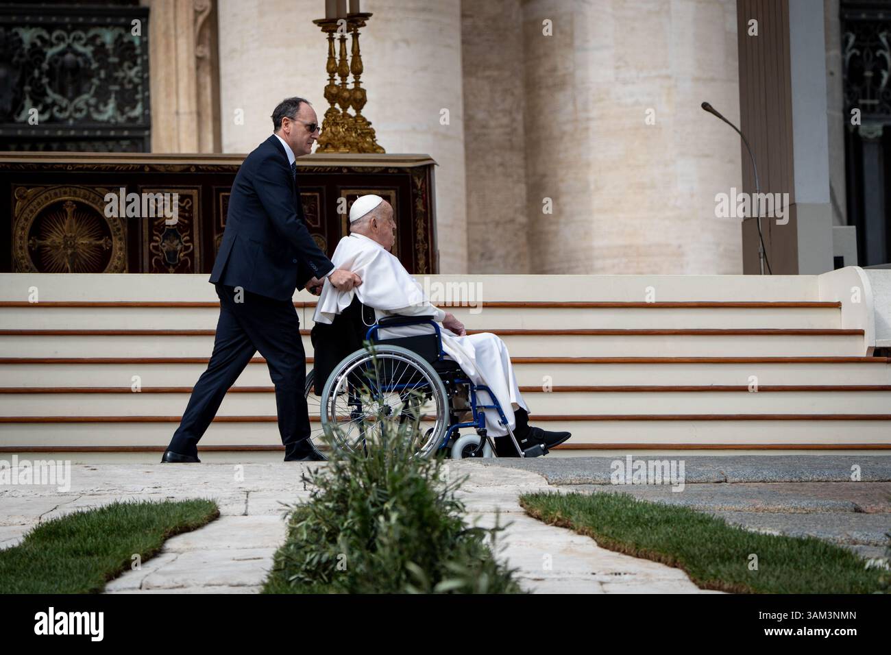 Pope Francis leaves St. Peter's Square in a wheelchair at the end of ...