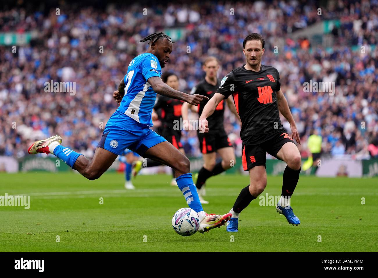 Peterborough United's Ricky-Jade Jones (left) and Birmingham City's Ben ...