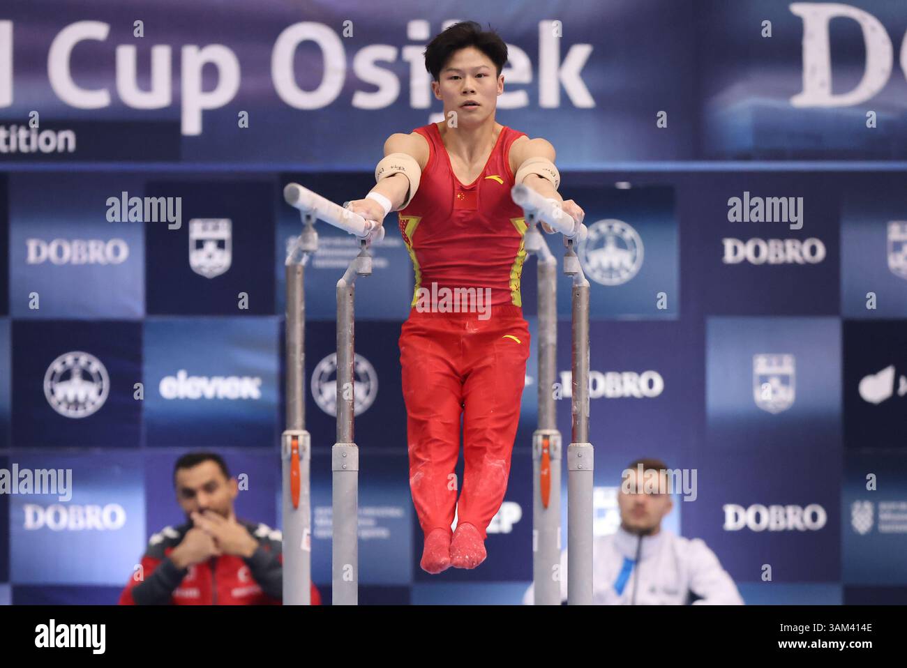 OSIJEK, CROATIA - APRIL 13: Xia Chenyl of China performs on paraller ...