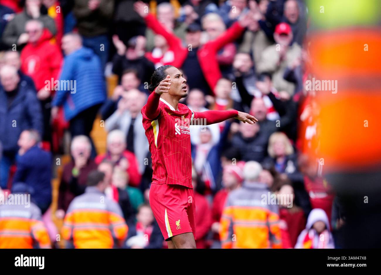 Liverpool's Virgil van Dijk celebrates after scoring his sides second ...
