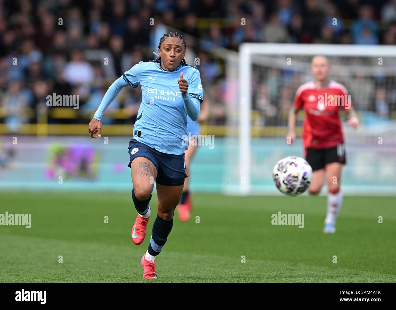 Manchester, UK. 13th Apr, 2025. Kerolin Nicoli of Manchester City Women chases the ball during ...