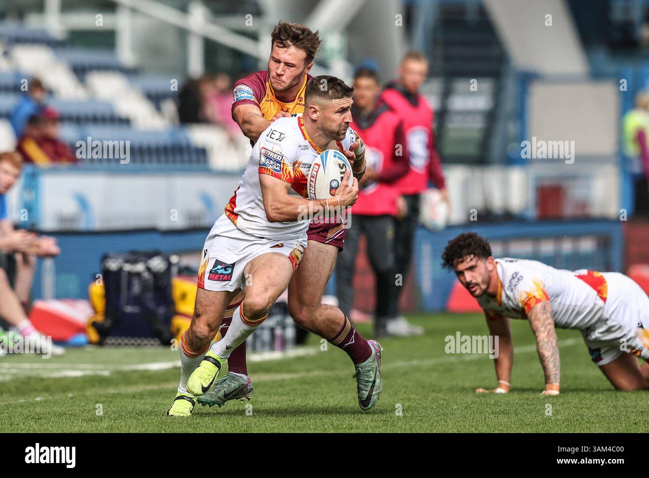 Huddersfield, UK. 13th Apr, 2025. Tommy Makinson of Catalan Dragons is ...