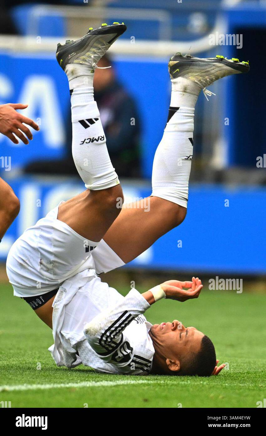 Real Madrid's Kylian Mbappe falls during a Spanish La Liga soccer match ...