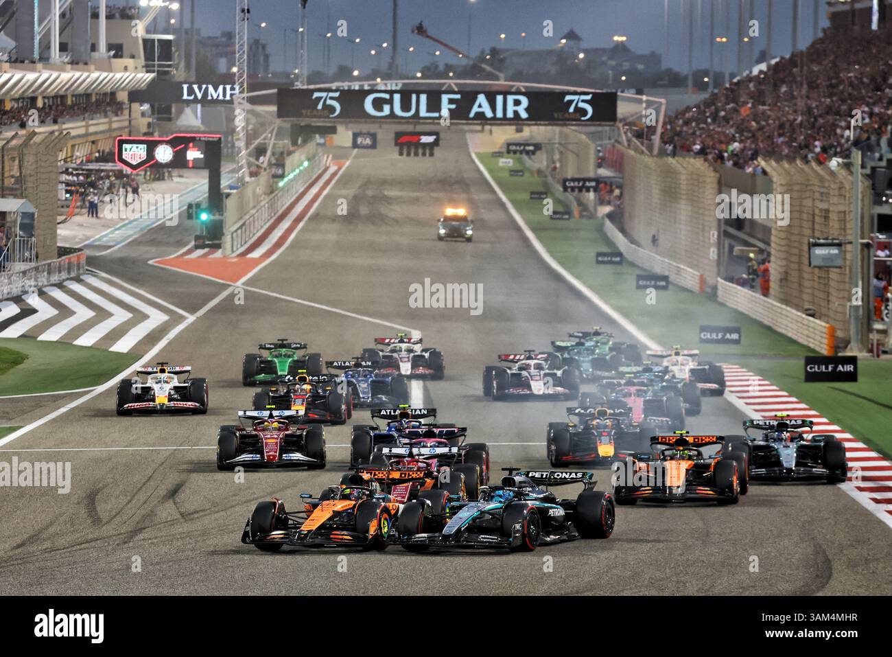 Sakhir, Bahrain. 13th Apr, 2025. (L to R): Oscar Piastri (AUS) McLaren ...