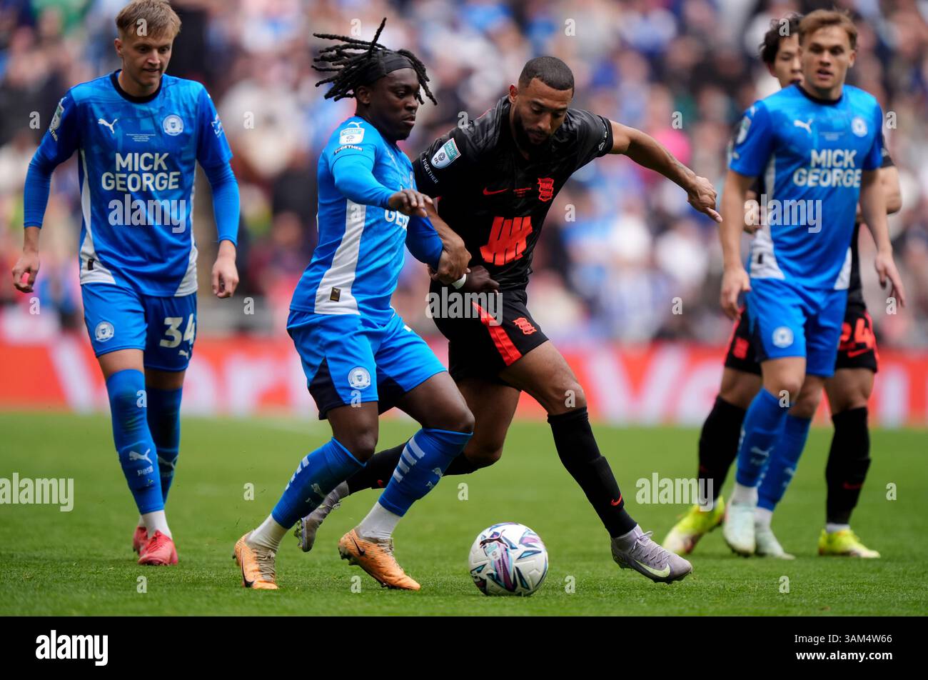 Birmingham City's Keshi Anderson (centre right) and Peterborough United ...