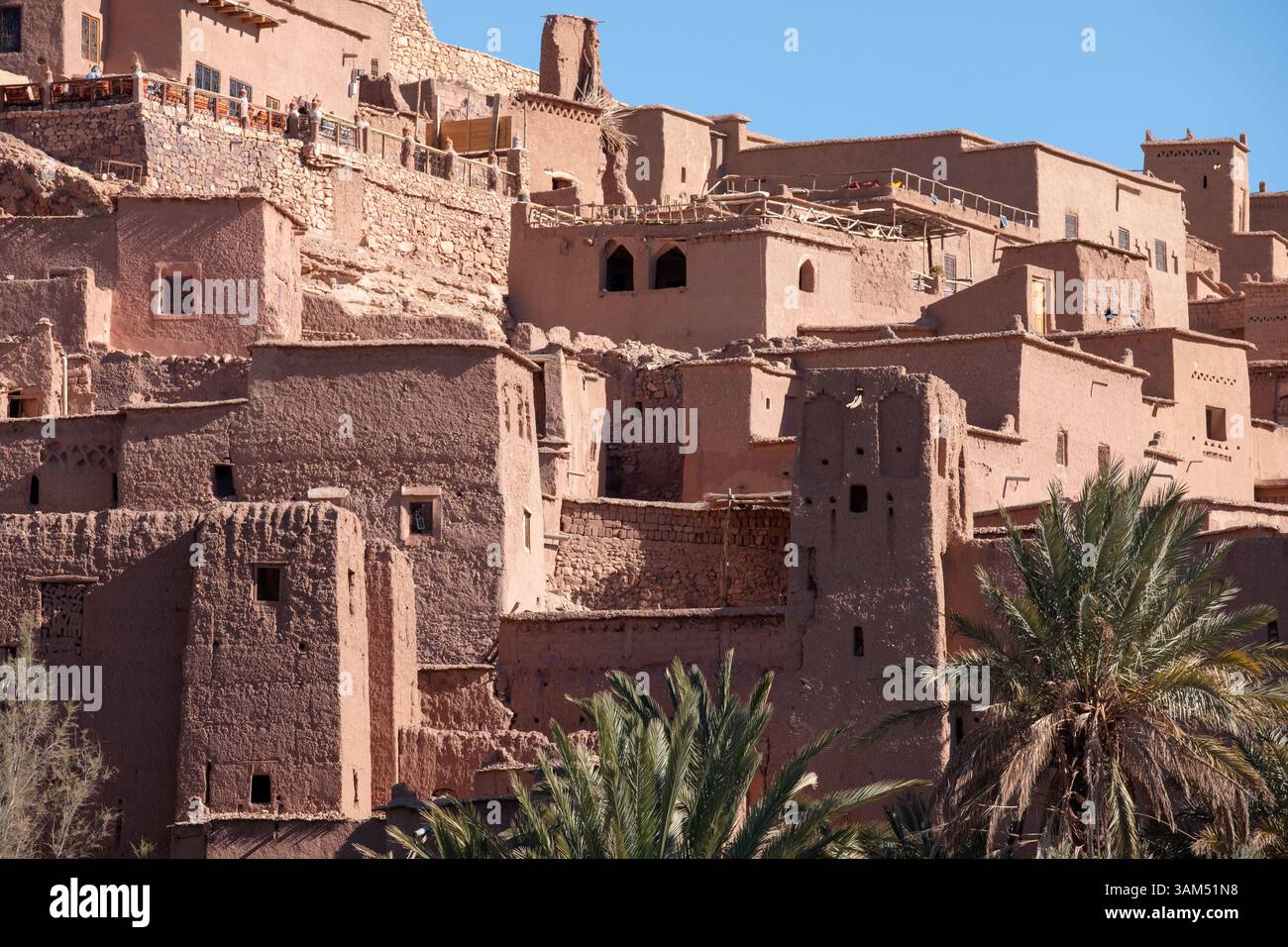 Red clay buildings in Ait Ben Haddou, fortified hill town village ...
