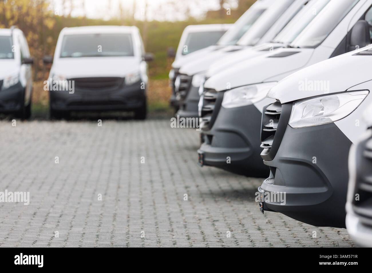 Fleet new modern electric hybrid hydrogen or diesel white vans parked ...