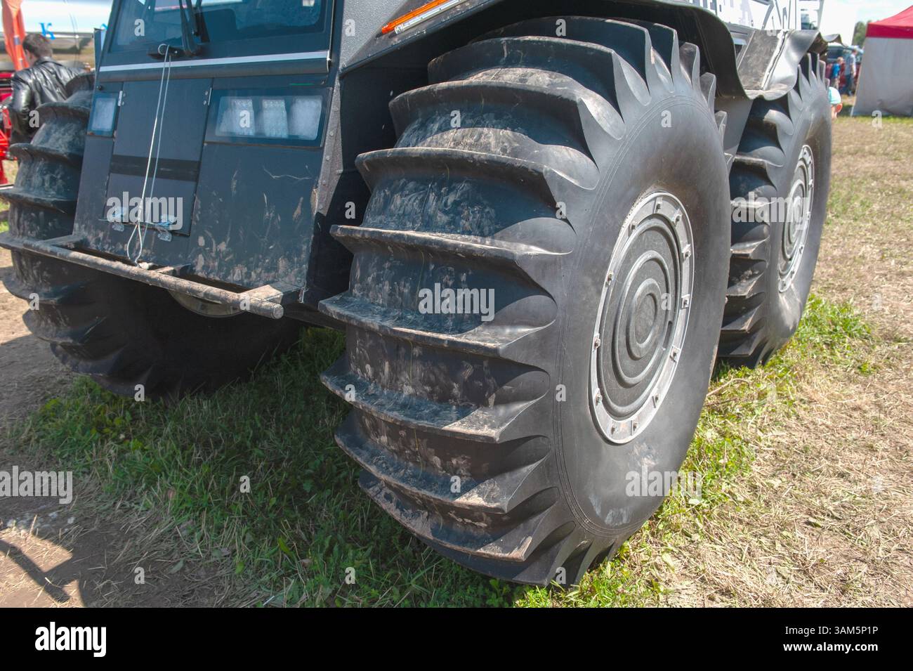 ATV - all-terrain vehicle wheel tread close-up. The large tread pattern ...