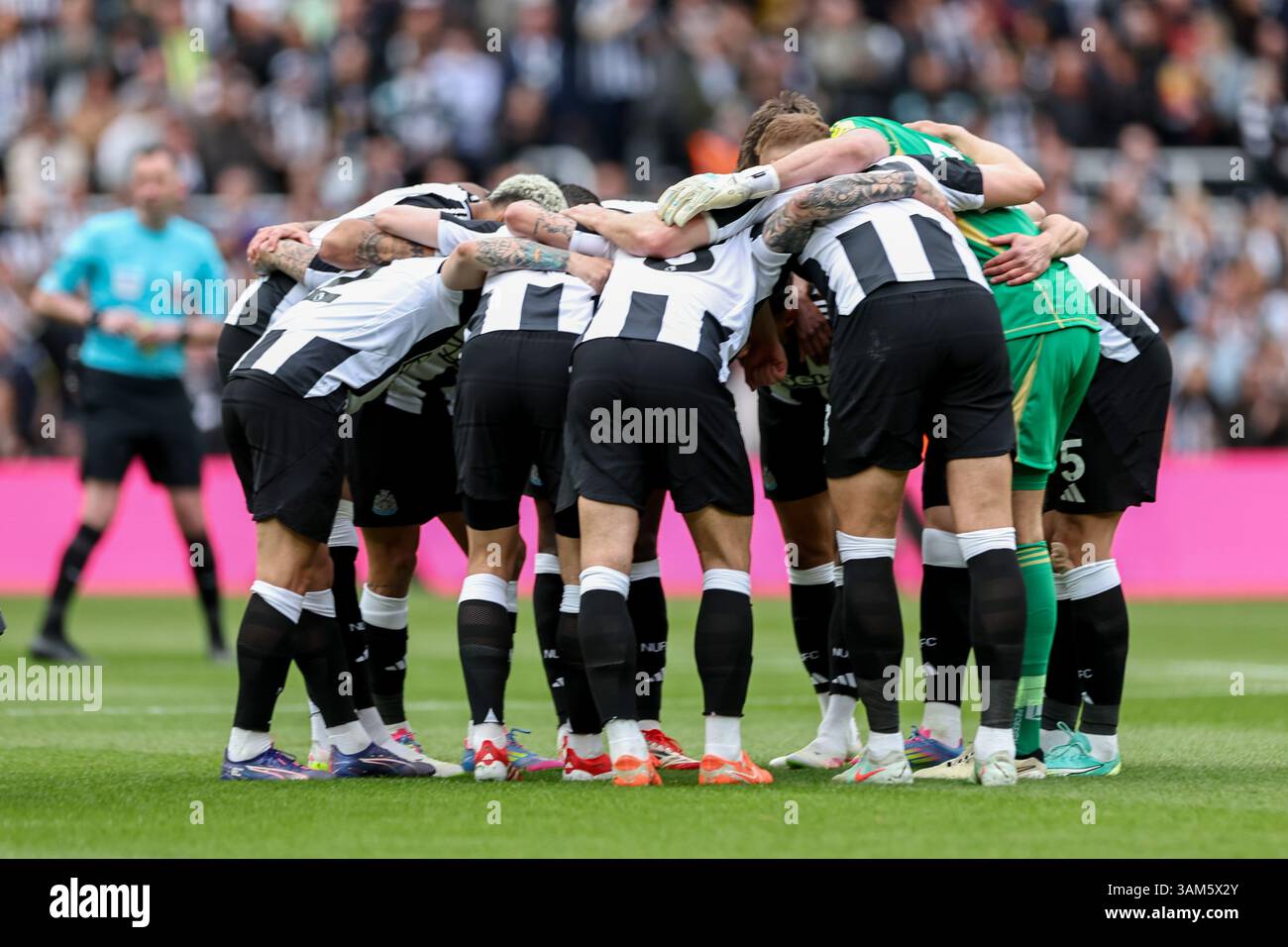 Newcastle United enter a huddle prior to the Premier League match ...