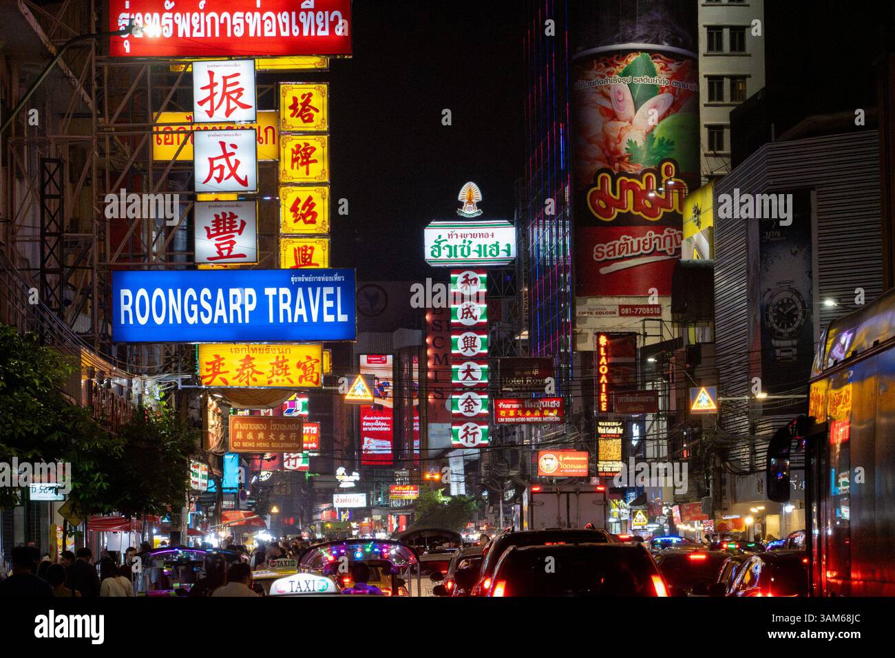 March 23, 2025, Bangkok, Thailand: Bustling Yaowarat Road at night in Chinatown neighbourhood ...