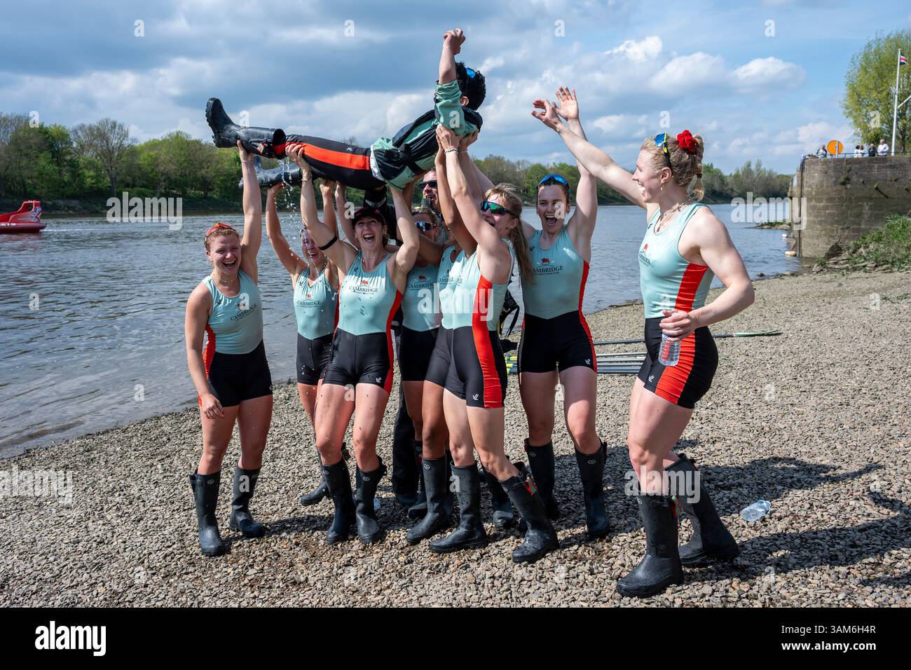 London, UK. 13 April 2025. Members of the Cambridge crew raise their ...