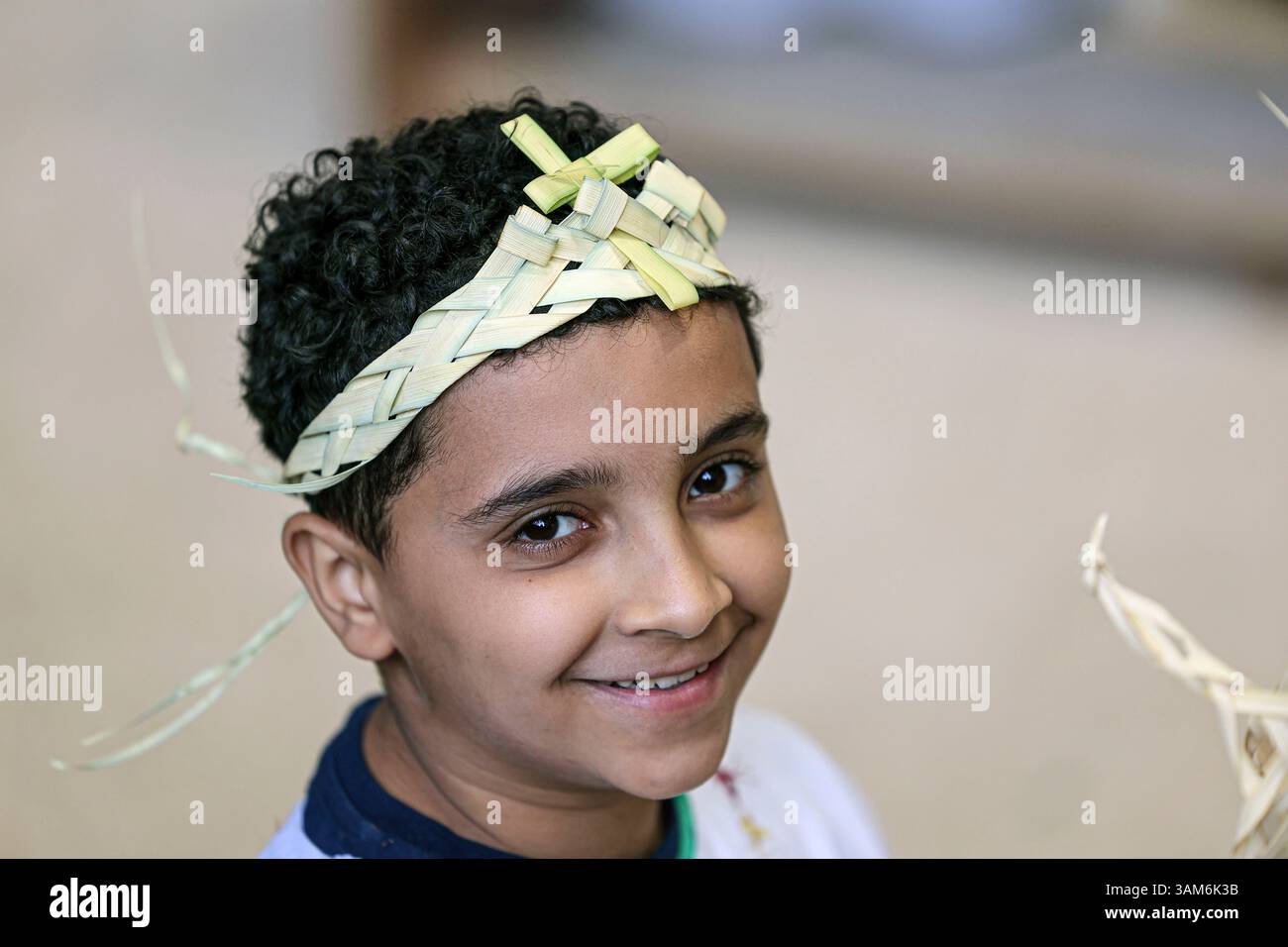 Cairo, Egypt. 13th Apr, 2025. A boy is pictured at a mass held to ...