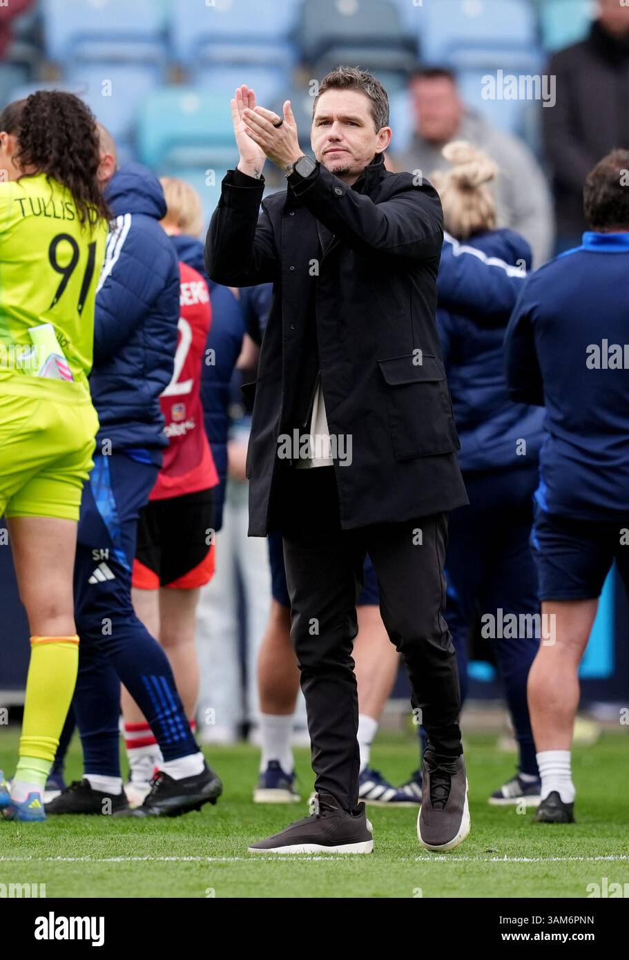 Manchester United manager Marc Skinner applauds the fans after the ...