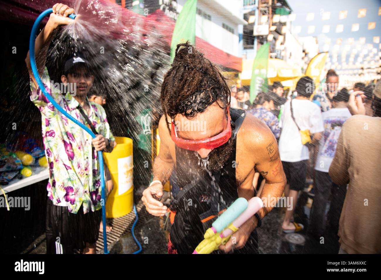 Locals and tourists Enjoying water fight during Songkran Festival at ...